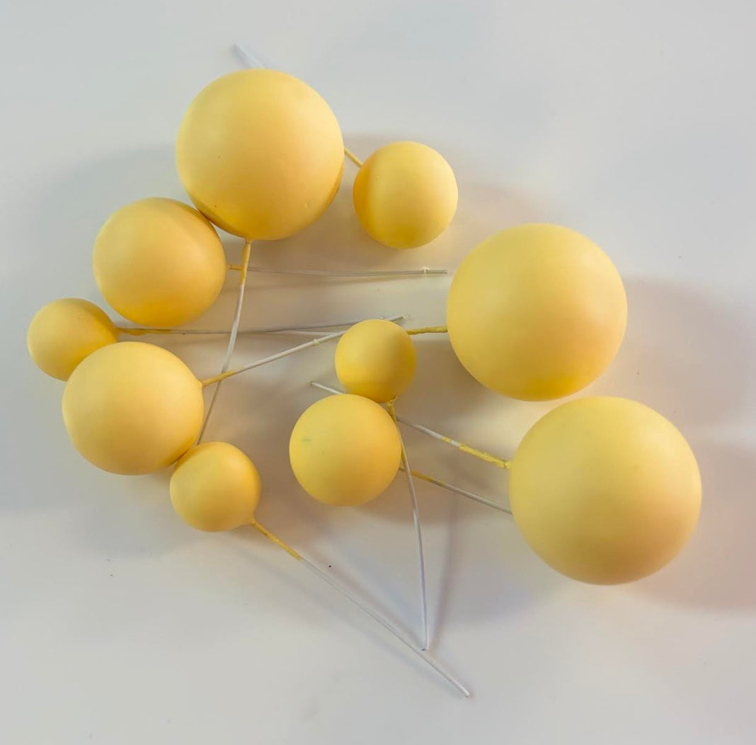 FAUX PASTEL YELLOW BALL CAKE TOPPERS – Planet Bounce